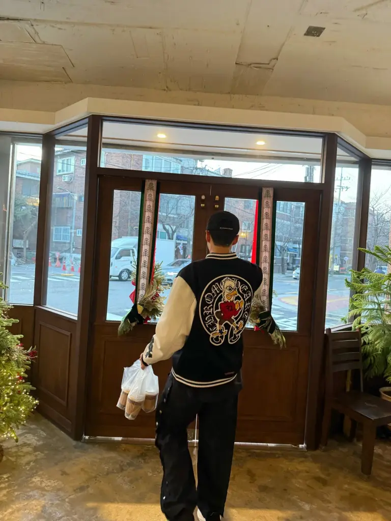 SEVENTEEN Hoshi Completes a Hip Modern Vintage Look with a Varsity Jacket